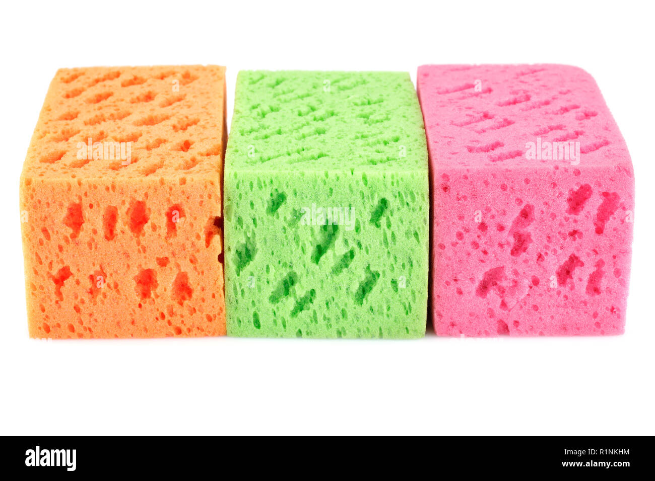Colorful sponges isolated on white background Stock Photo - Alamy