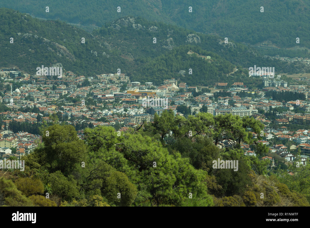 Mountain town panoramic view. landscape with a city between the hills ...