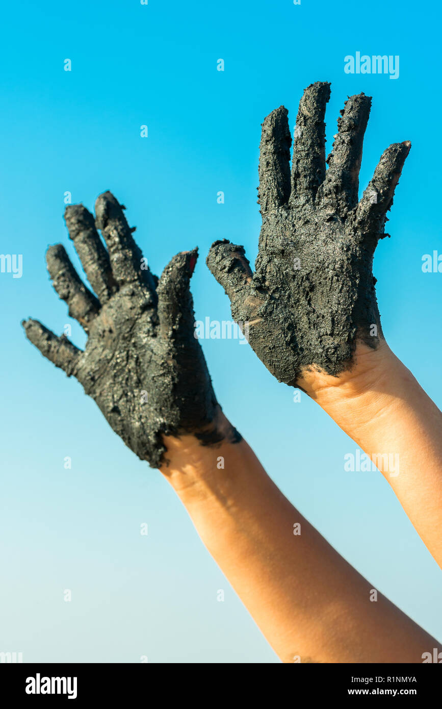 hands in the mud Stock Photo - Alamy