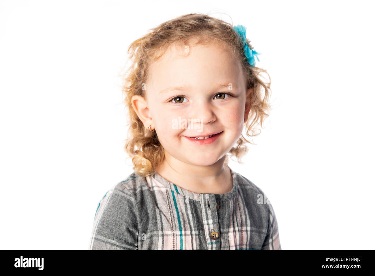 A little girl 3 years old isolated on white background Stock Photo - Alamy