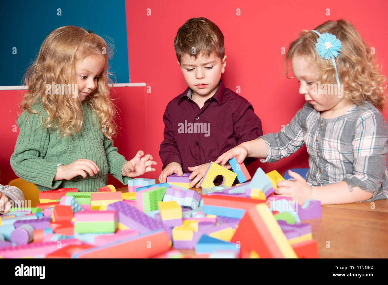 The preschoolers group in kindergarten together, Nursery group play ...