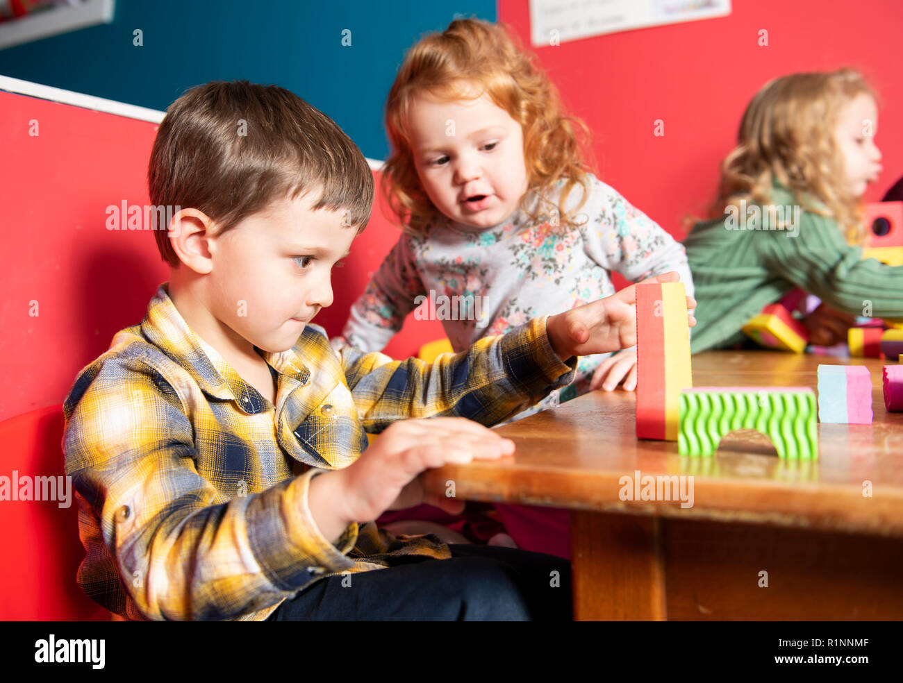 The preschoolers group in kindergarten together, Nursery group play ...