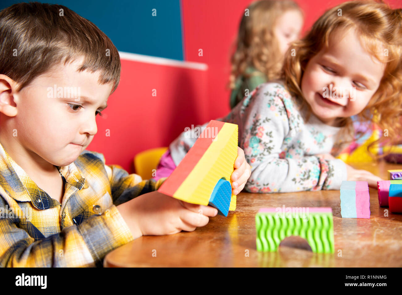 The preschoolers group in kindergarten together, Nursery group play ...