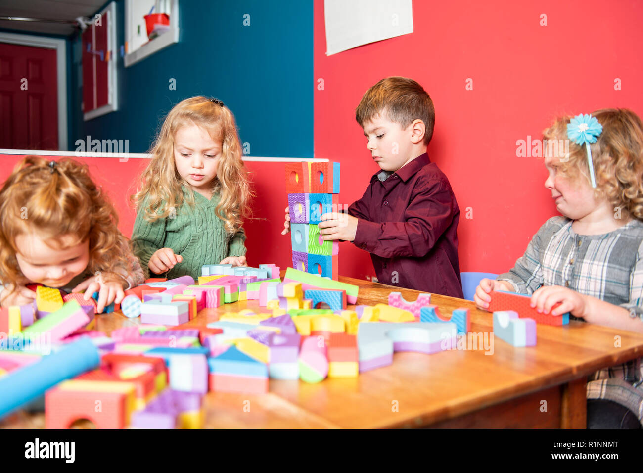 The preschoolers group in kindergarten together, Nursery group play ...