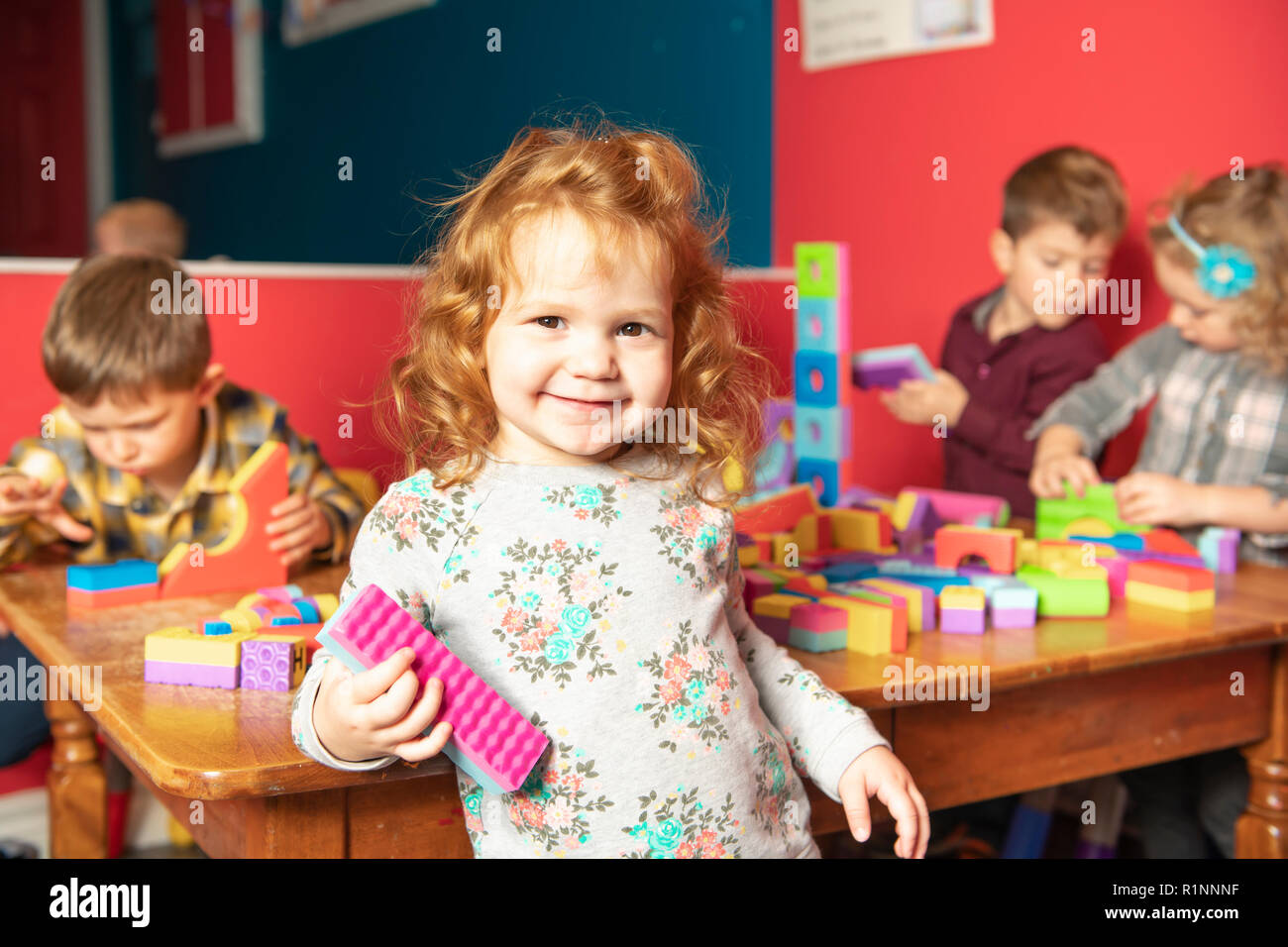The preschoolers group in kindergarten together, Nursery group play ...