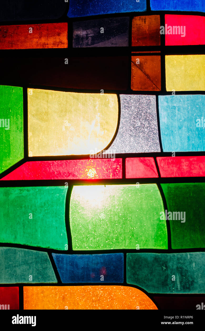 Sun light goes through the multiple colors of this window Stock Photo ...