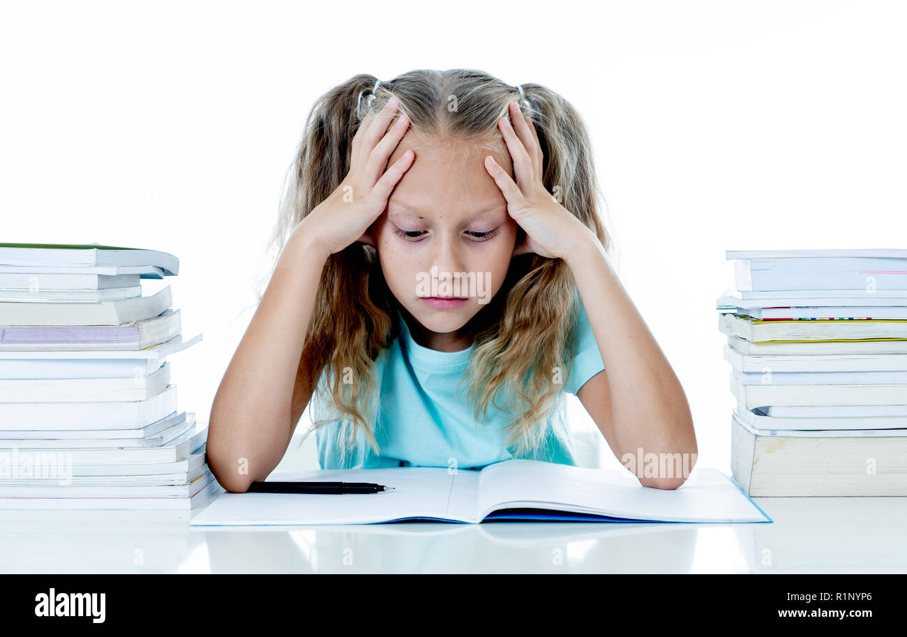 Beautiful school girl trying to study having too many homework that It ...