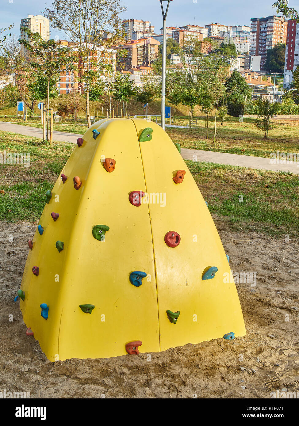 Children climbing Bouldering wall in a park Stock Photo - Alamy