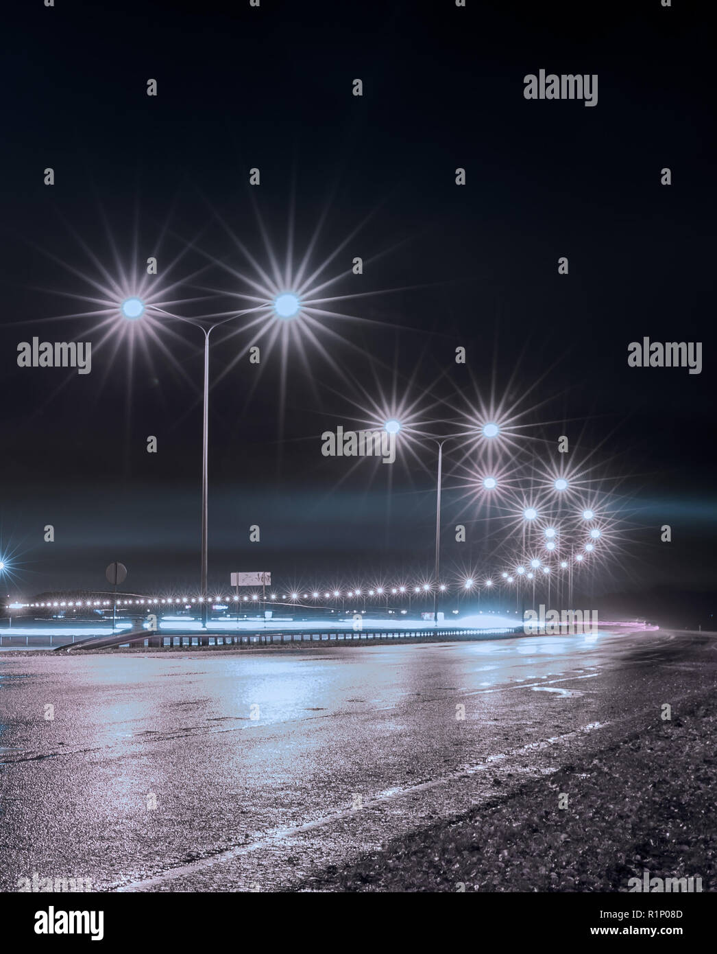 night empty highway under lanterns light concept Stock Photo - Alamy