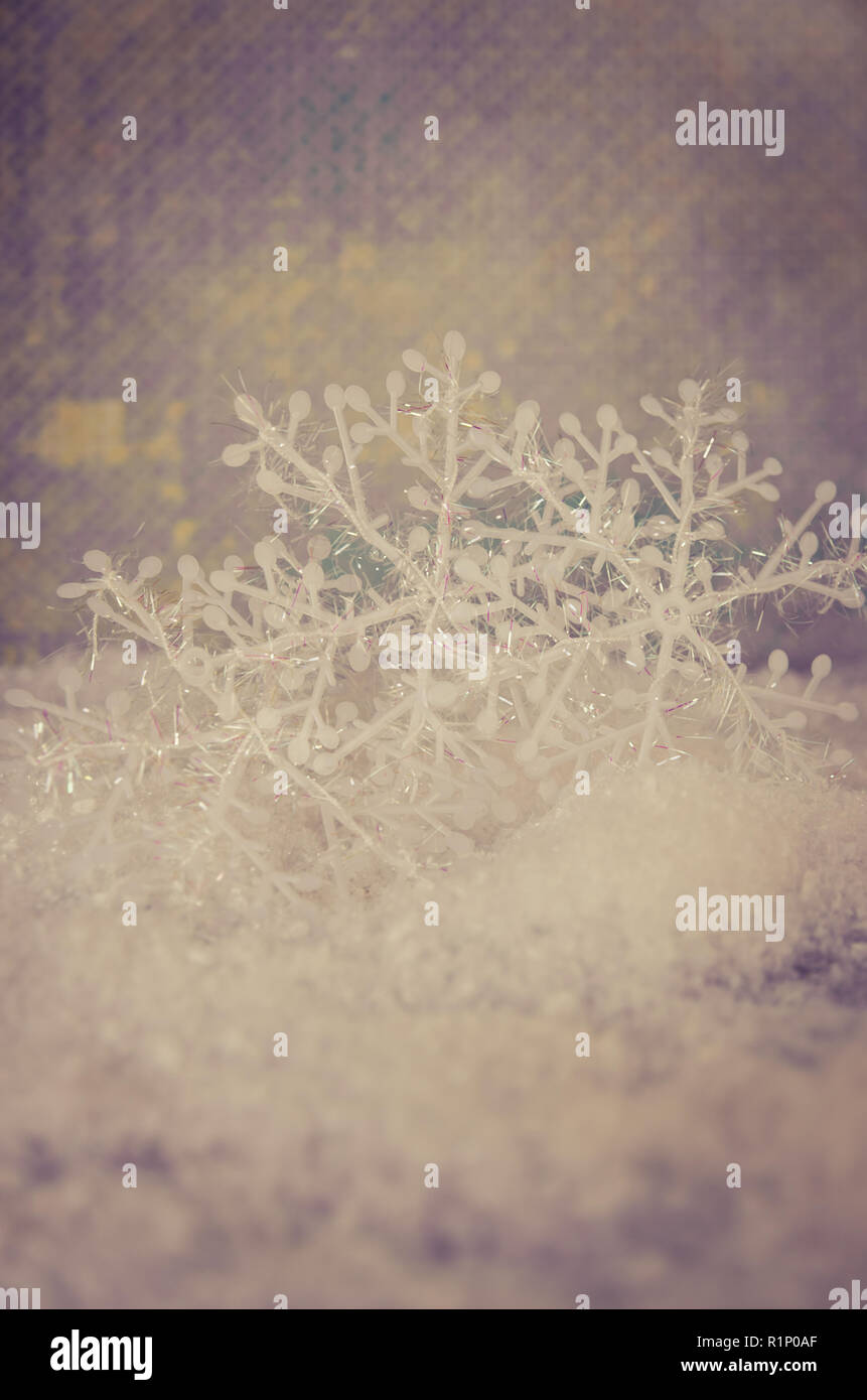 simple white snowflake decoration in snowy background Stock Photo - Alamy