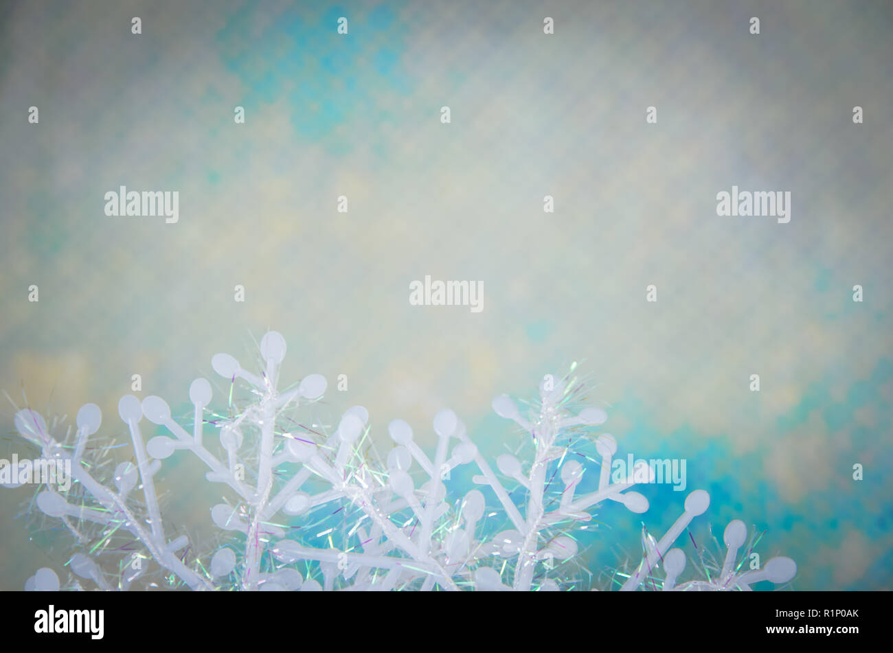 simple white snowflake decoration in snowy background Stock Photo - Alamy