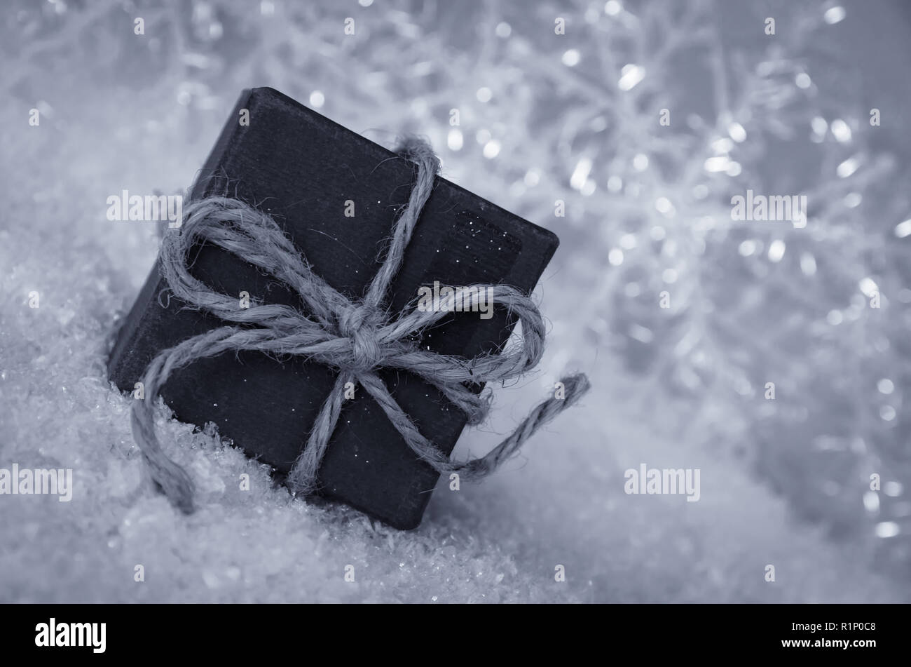 simple blue christmas box with surprise inside in golden background ...