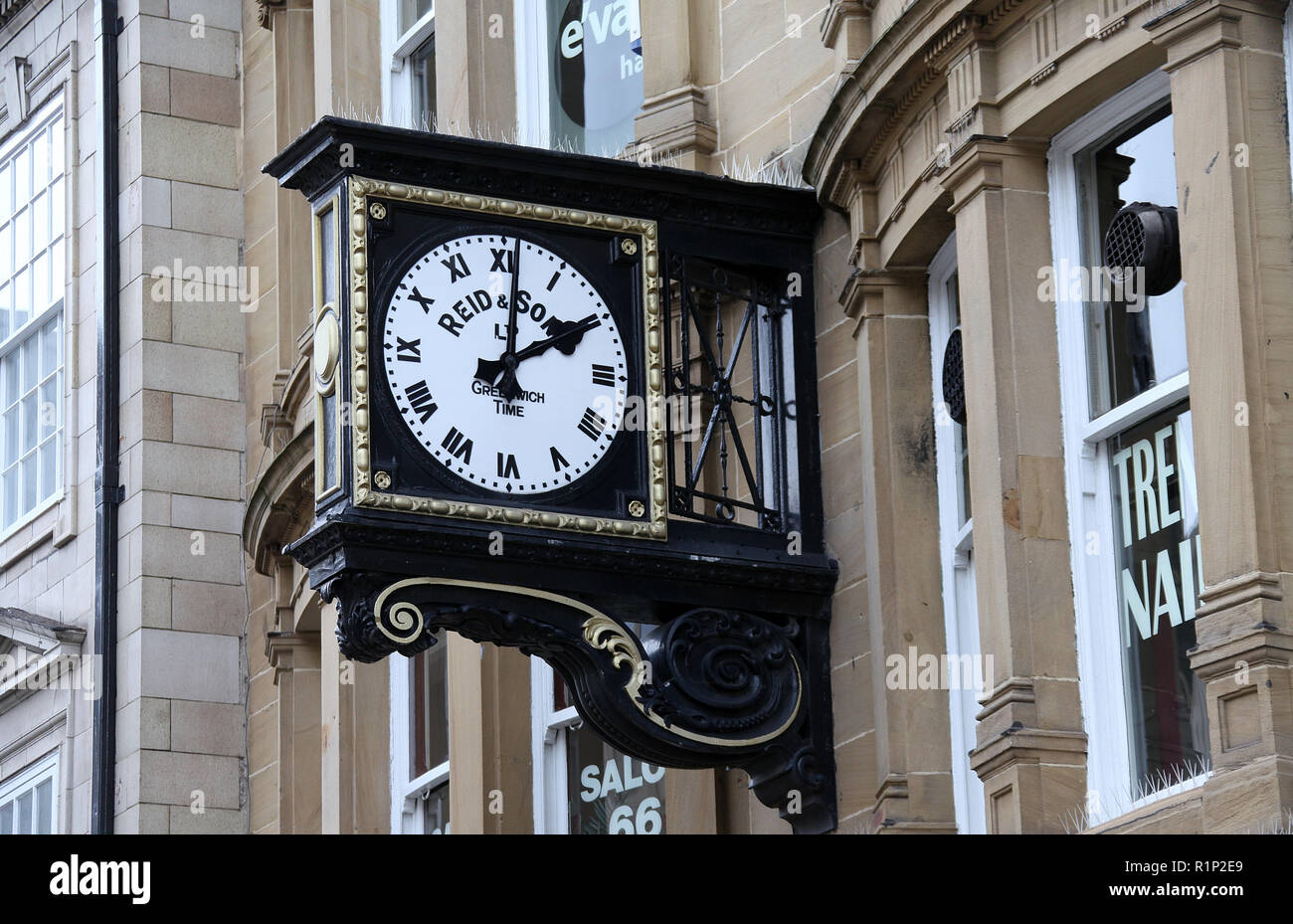 Reids and Sons Clock on Gem House in the city centre of Newcastle upon ...