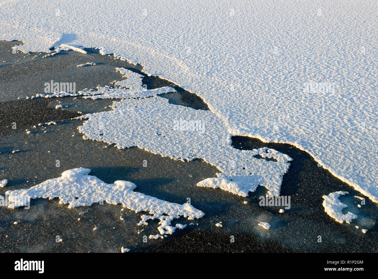 Ice surface of frozen lake Stock Photo - Alamy