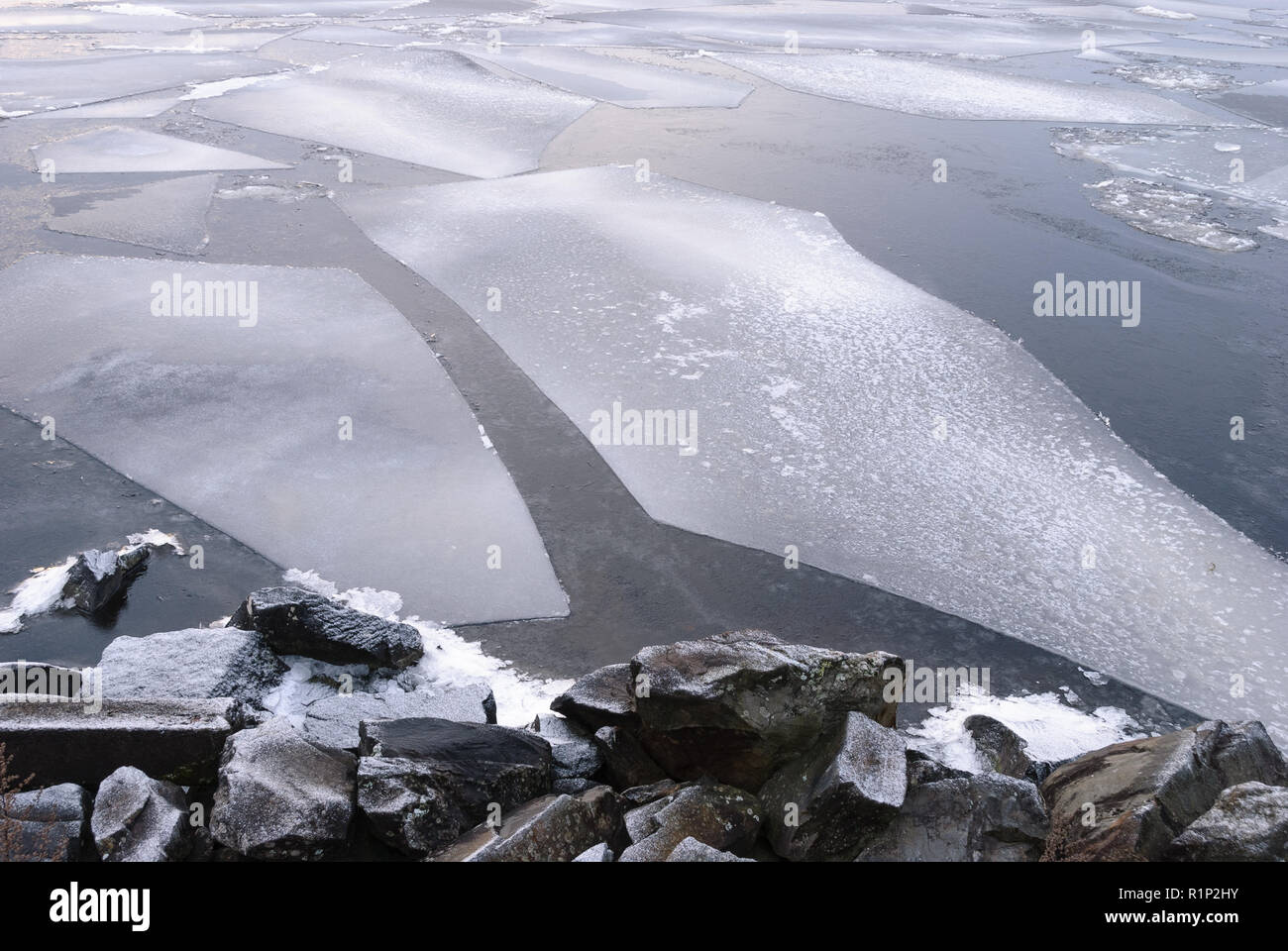 Freezing lake ice Stock Photo - Alamy