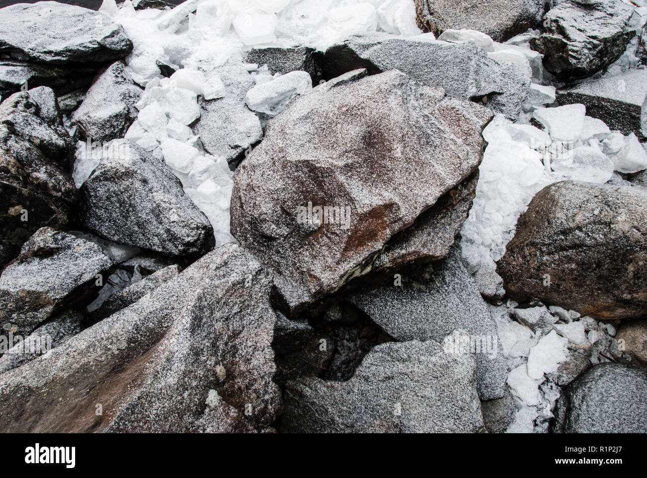 Ice and rocks on the beach Stock Photo - Alamy
