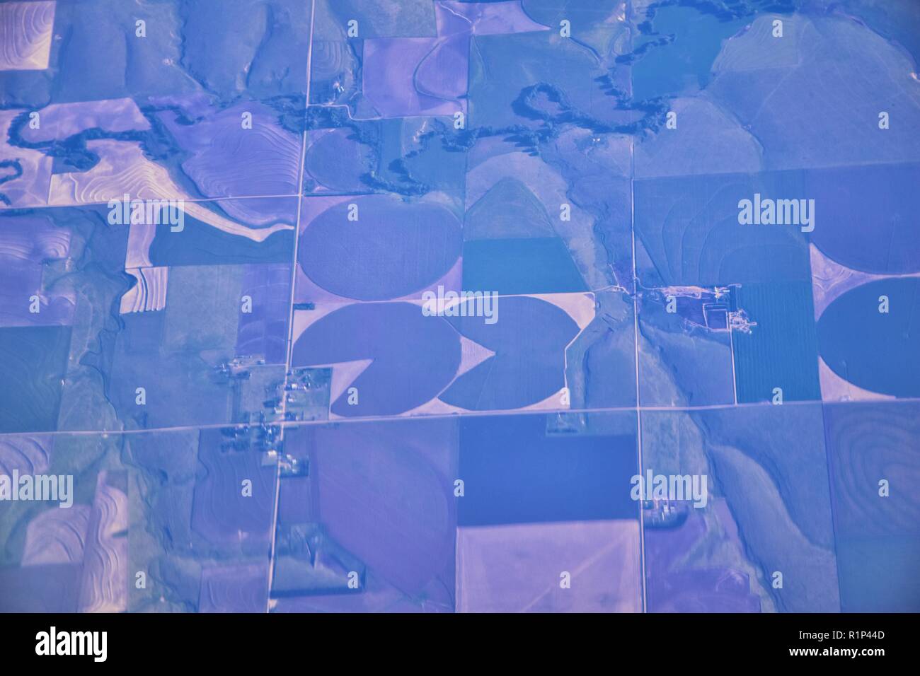 Aerial view of crop circles and squares over midwest states on flight ...