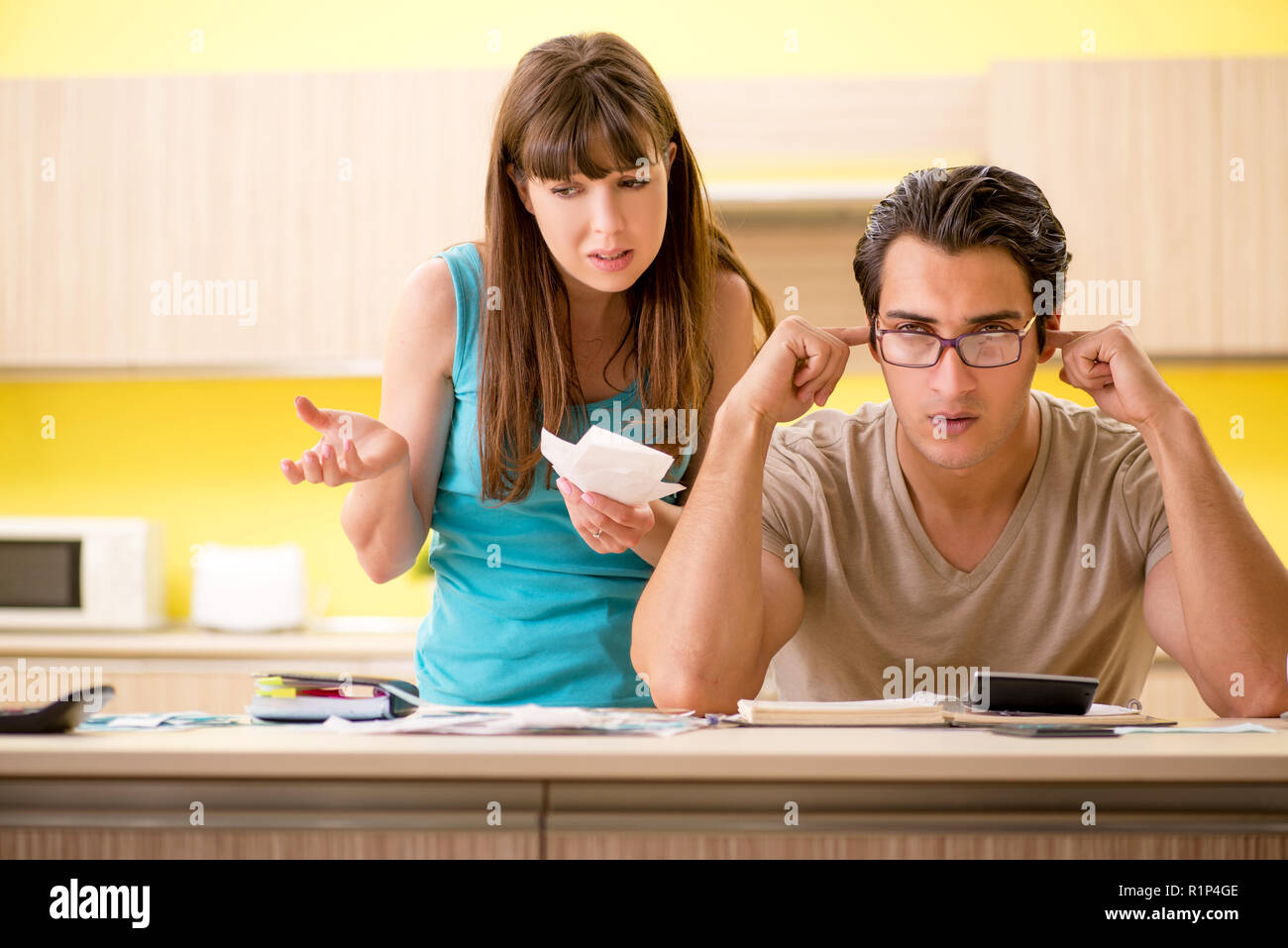 Young family struggling with personal finance Stock Photo - Alamy
