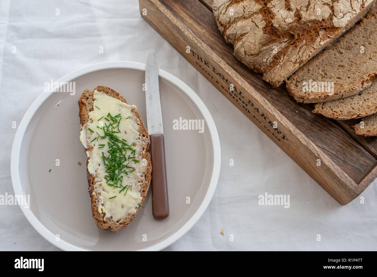 Butter and bread for breakfast Stock Photo - Alamy