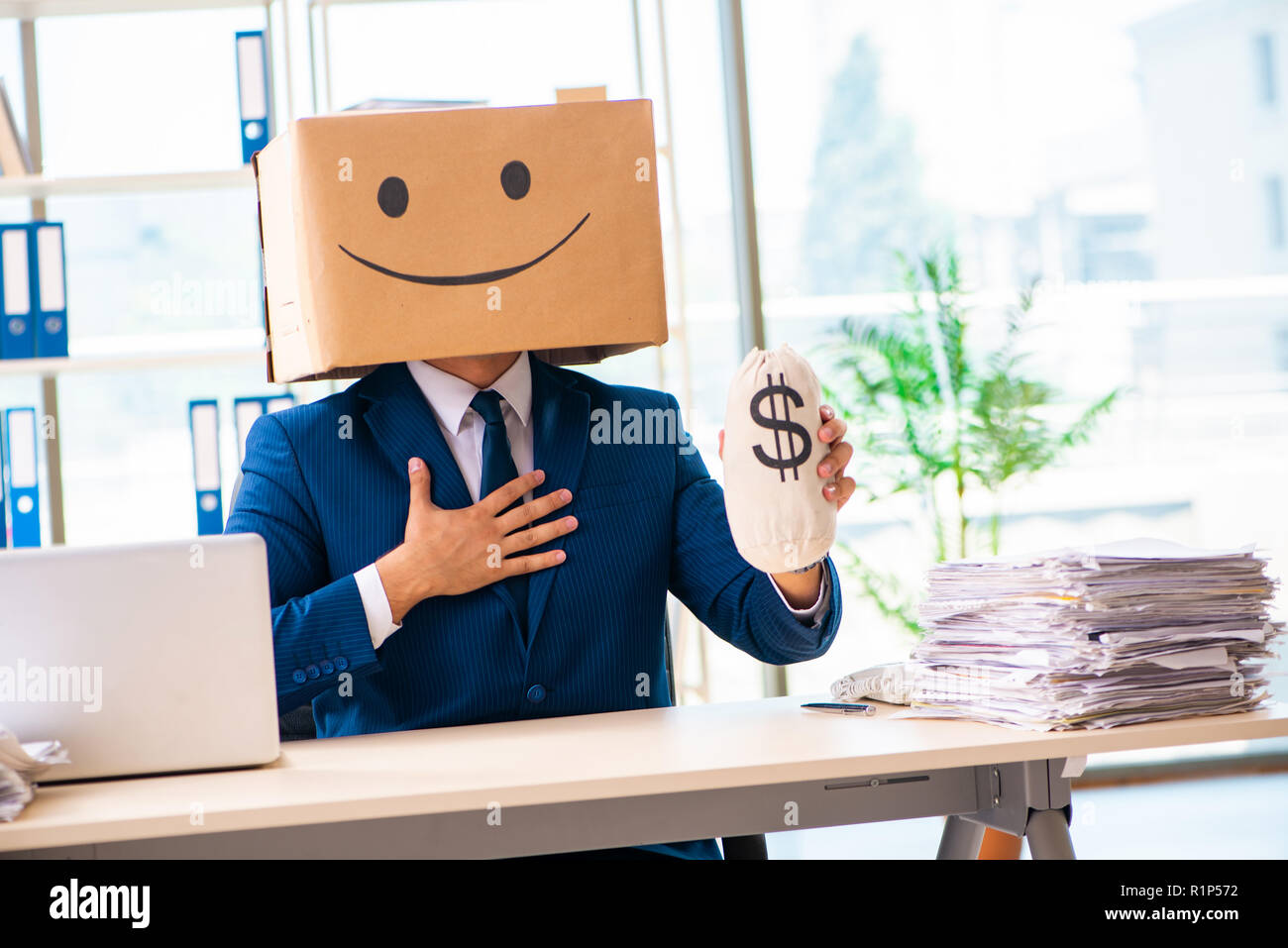 Happy man with box instead of his head Stock Photo - Alamy