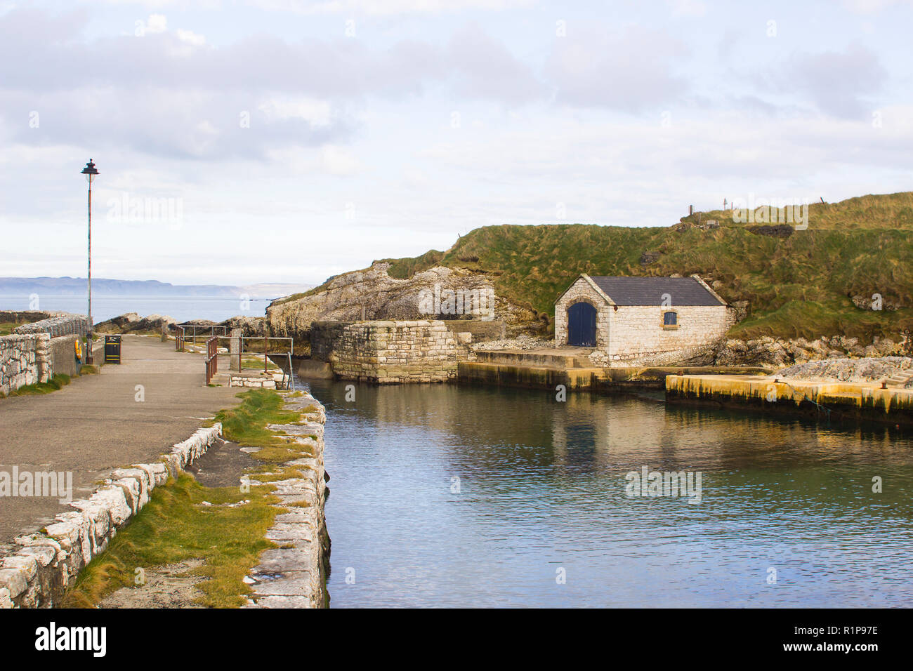 The small harbor at Ballintoy on the North Antrim Coast of Northern ...