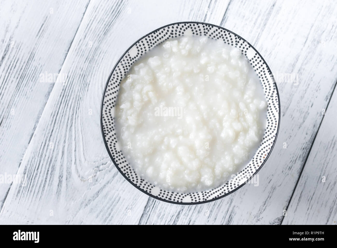 Bowl of congee - Asian rice porridge Stock Photo - Alamy