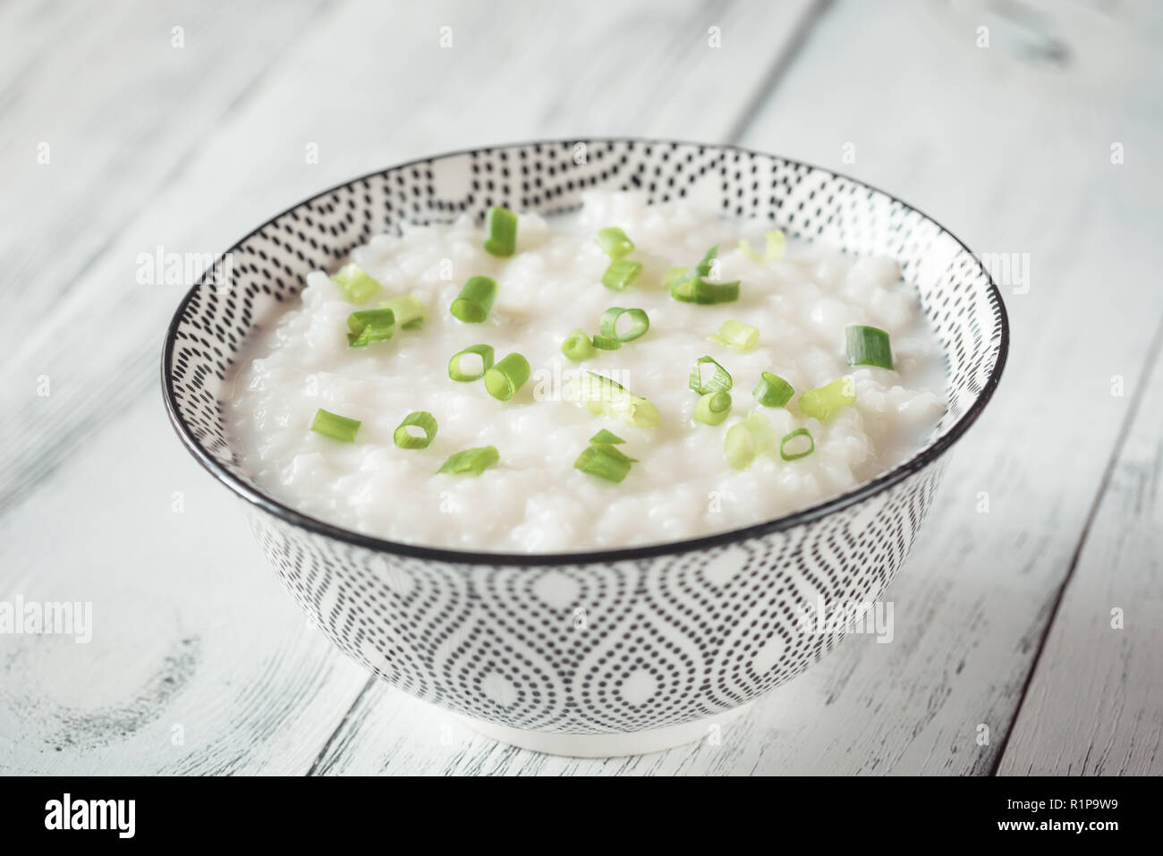 Bowl of congee - Asian rice porridge Stock Photo - Alamy