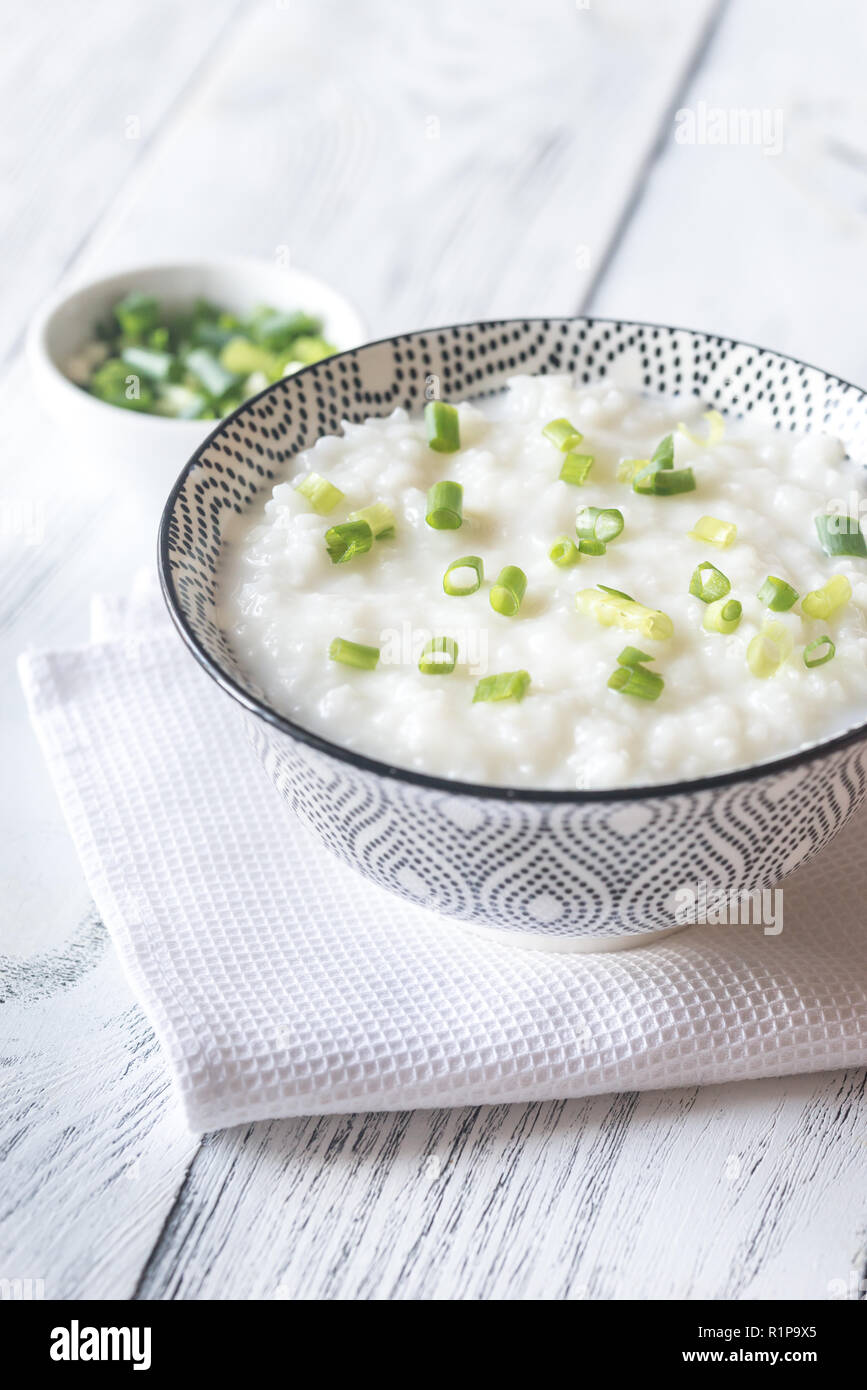 Bowl of congee - Asian rice porridge Stock Photo - Alamy