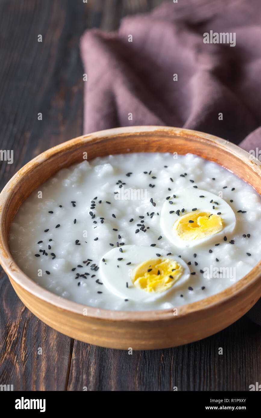 Bowl of congee - Asian rice porridge Stock Photo - Alamy