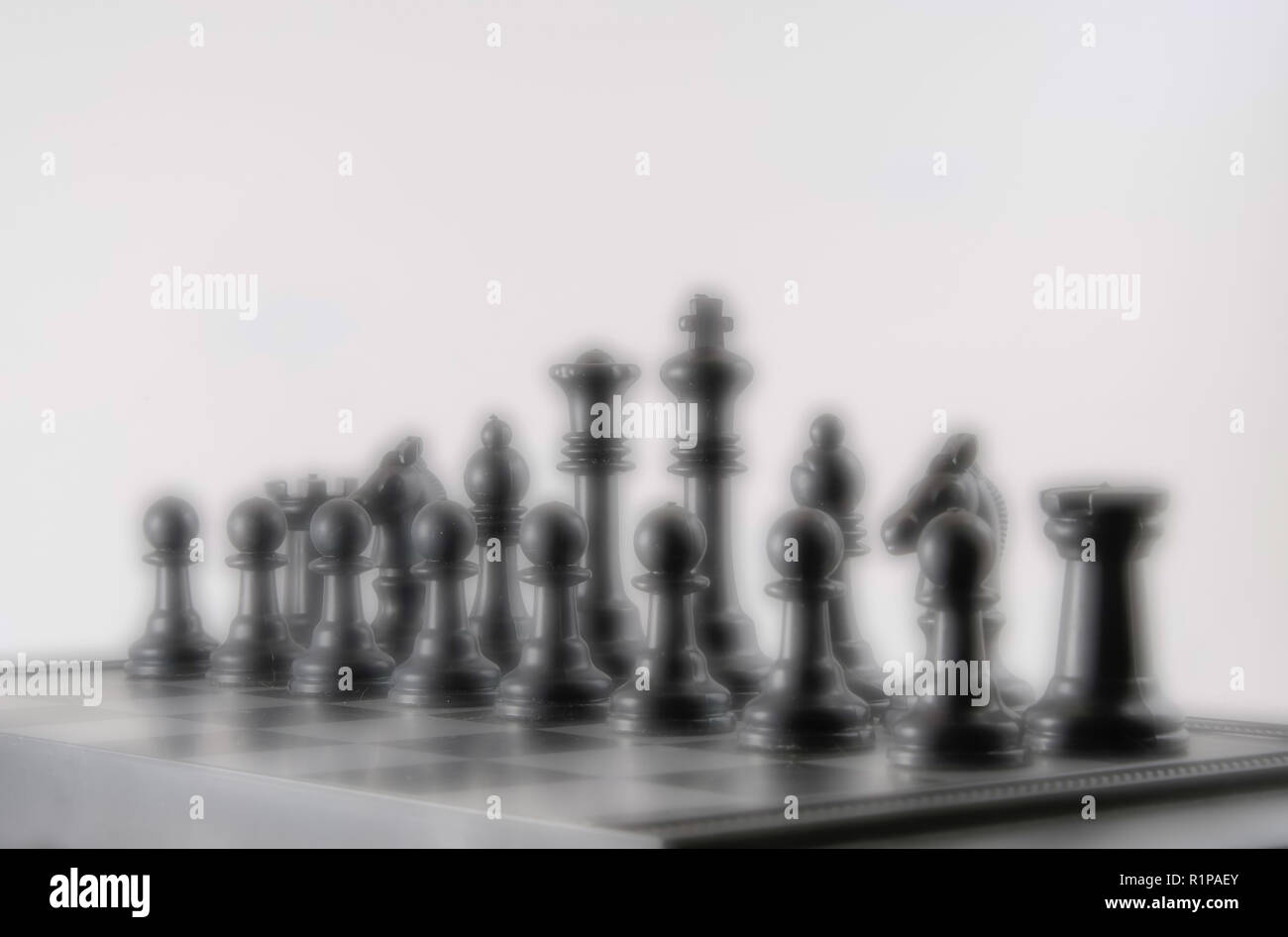 Black chess side view on a black background 2018 Stock Photo - Alamy