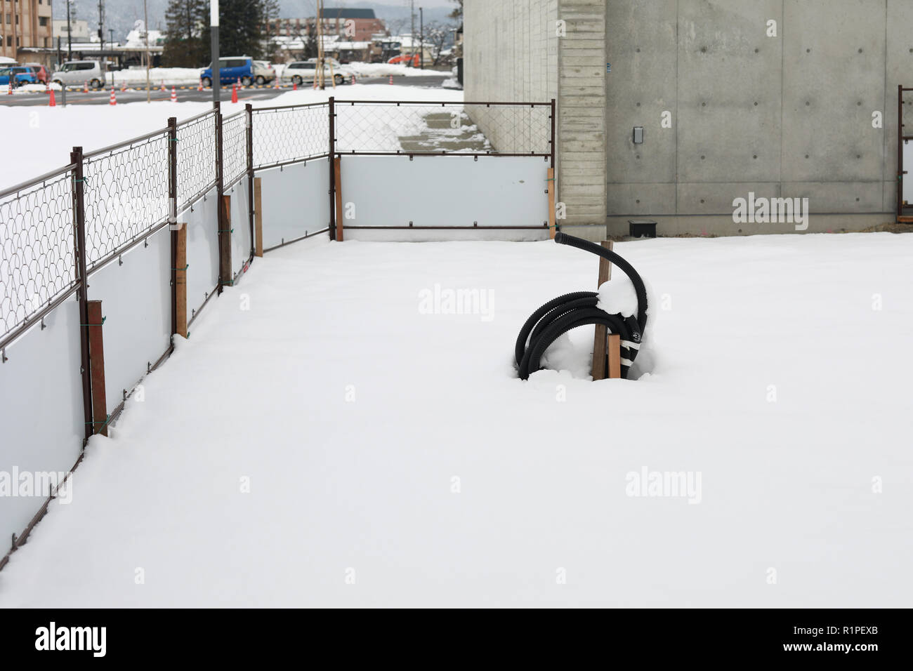 Electric cable on the snow floor Stock Photo - Alamy