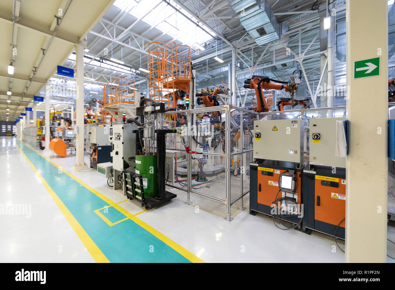 Car manufacturing plant. Automotive shop. The Assembly line for ...