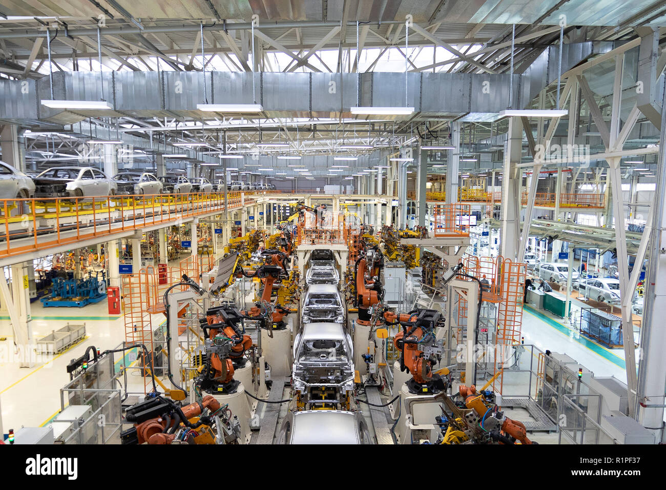 body of car on conveyor Modern Assembly of cars at plant. automated ...