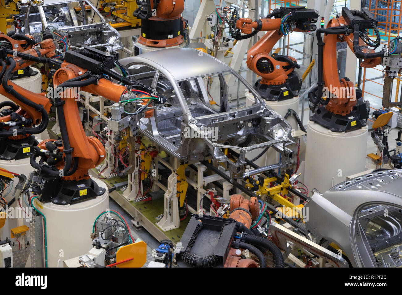 body of car on conveyor top view. Modern Assembly of cars at the plant ...