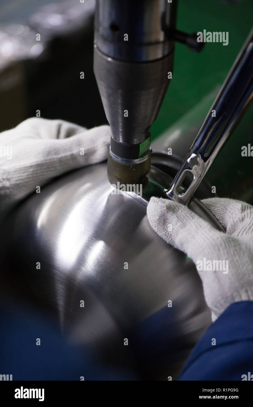 Stainless steel metal bowl manufacturing plant detail shot assembly ...