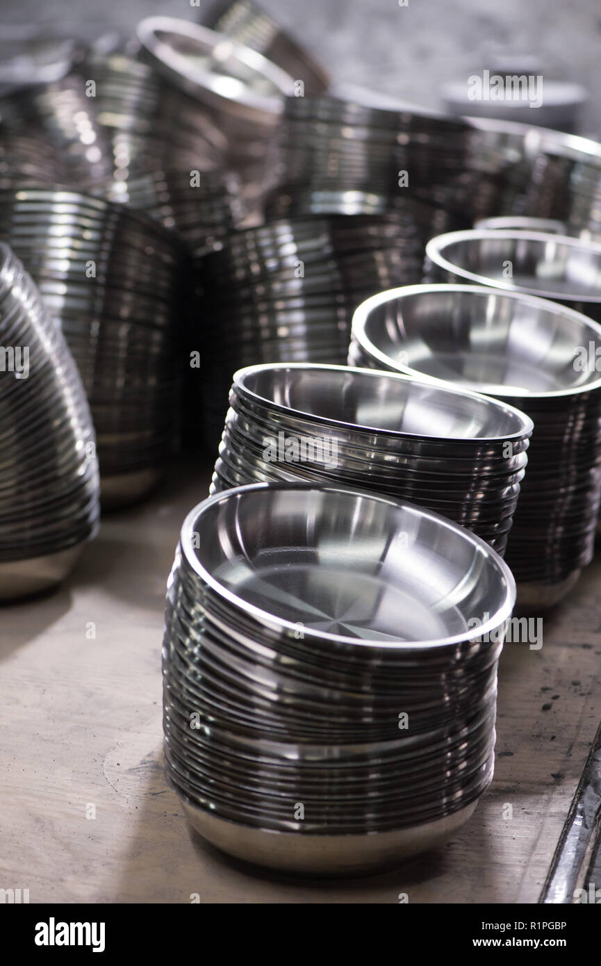Stainless steel metal bowl manufacturing plant detail shot assembly ...