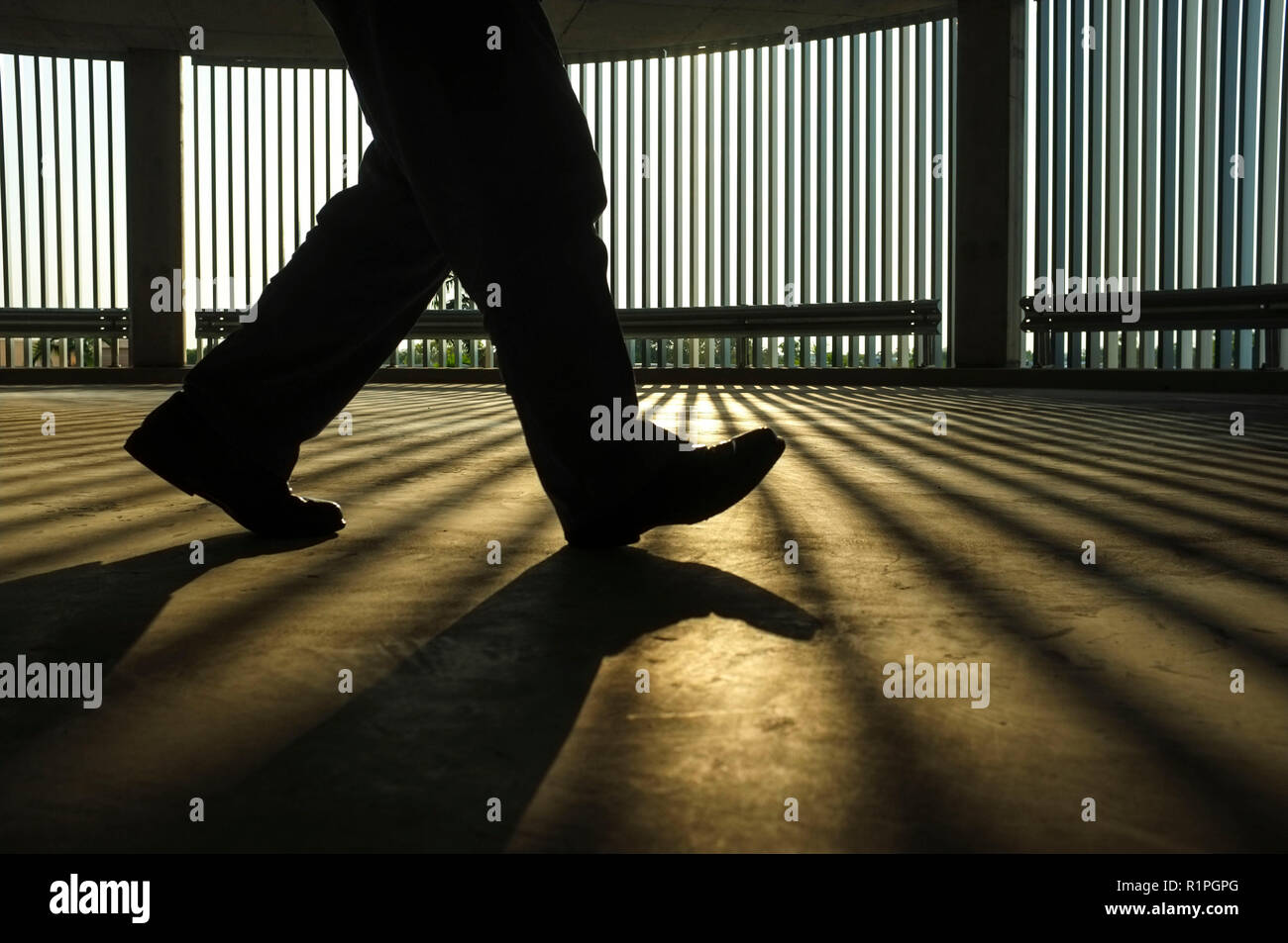 Man in shadows spying hi-res stock photography and images - Alamy