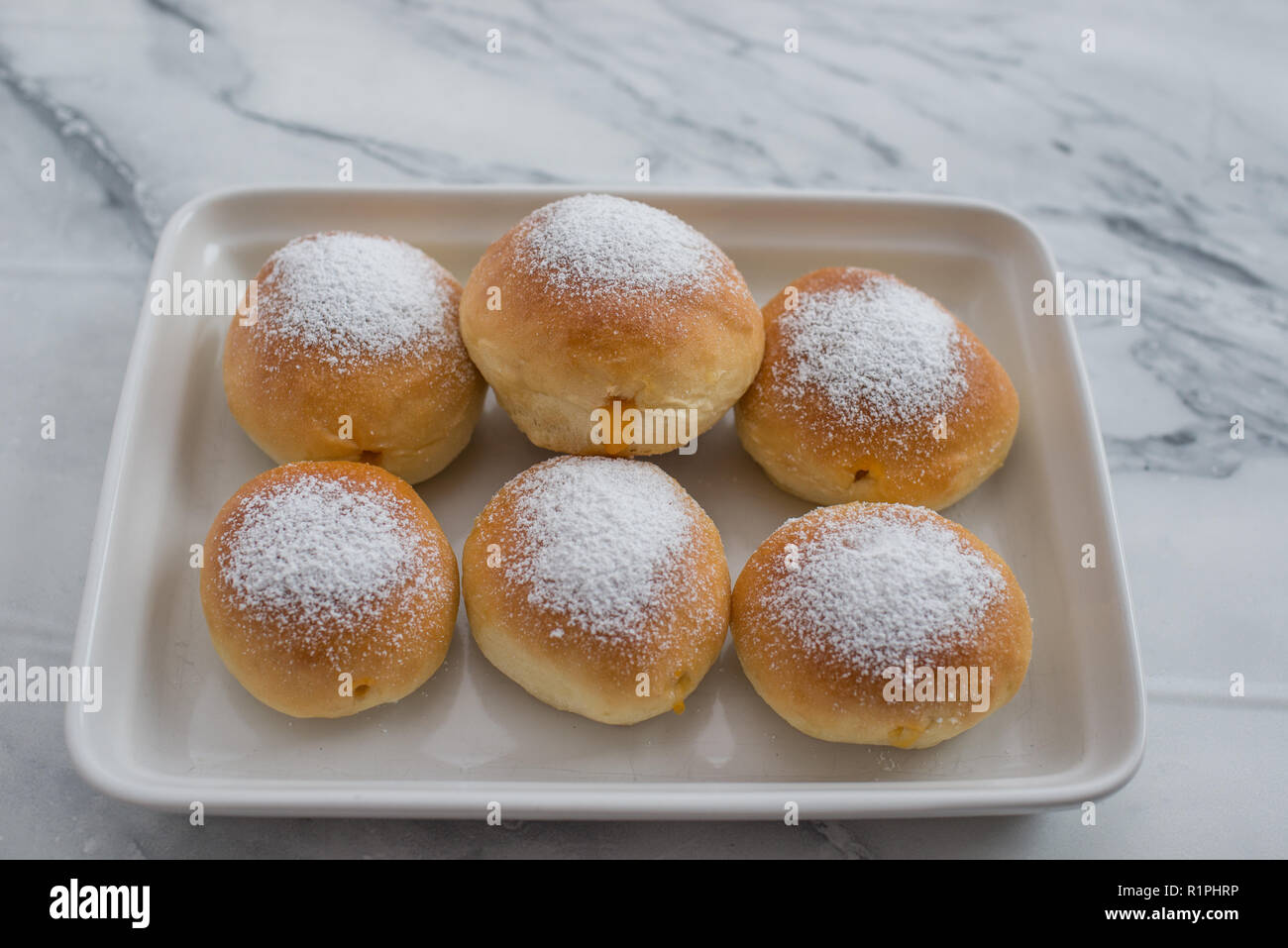 Stuffed vanilla donut hi-res stock photography and images - Alamy