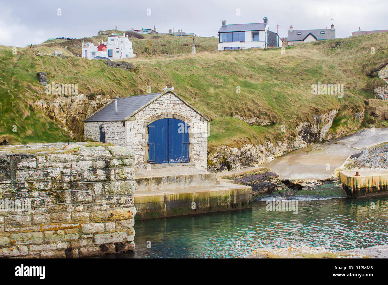 The small harbor at Ballintoy on the North Antrim Coast of Northern ...
