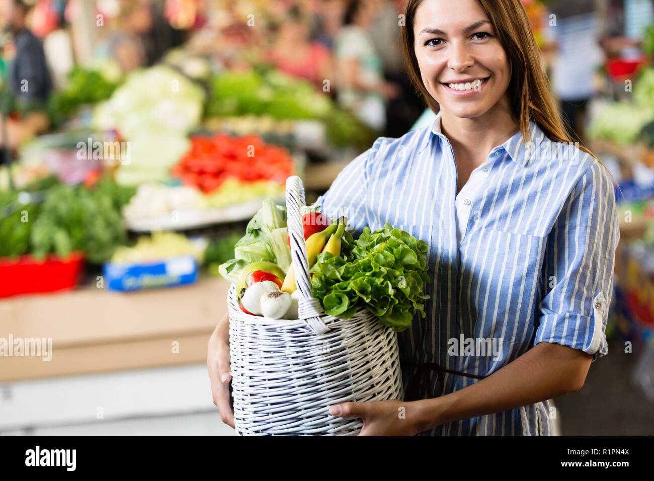 Beautiful happy young women shopping vegetables and fruits Stock Photo ...
