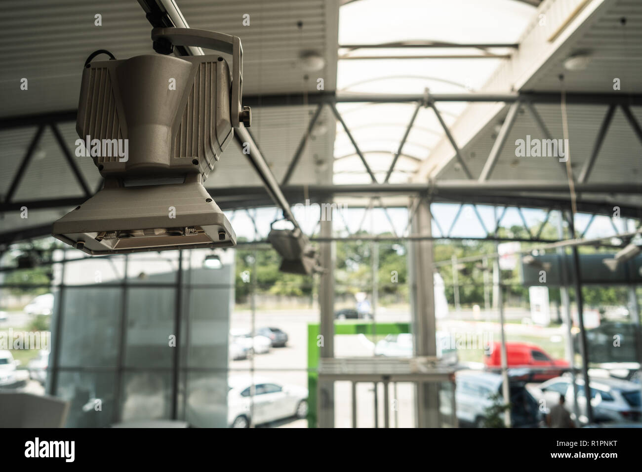 Spotlight hang from the ceiling in the exhibition hall Stock Photo - Alamy