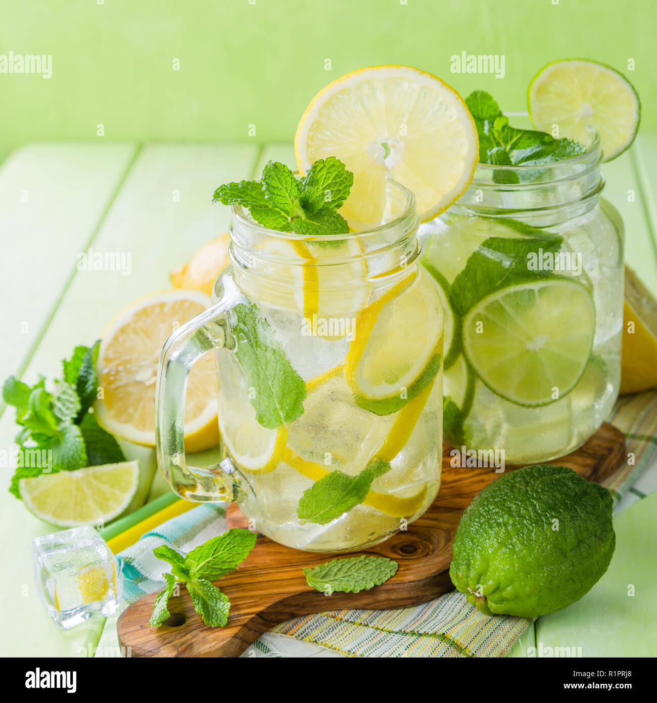 Selection of infused water for detox, wood background Stock Photo - Alamy