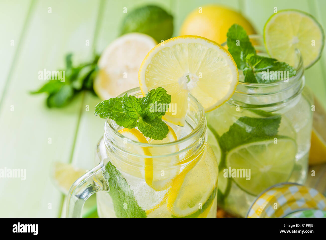Selection of infused water for detox, wood background Stock Photo - Alamy