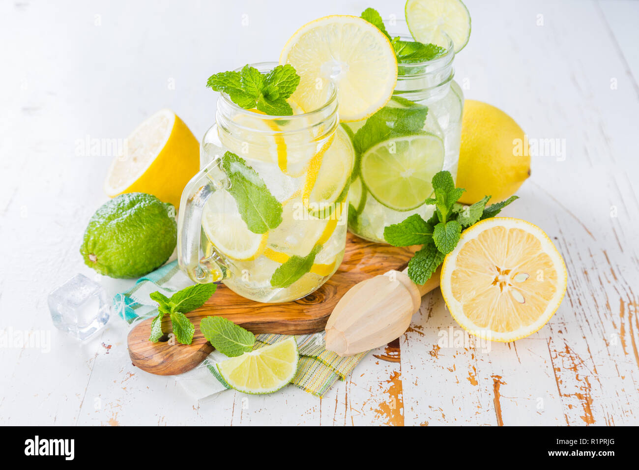 Selection of infused water for detox, wood background Stock Photo - Alamy