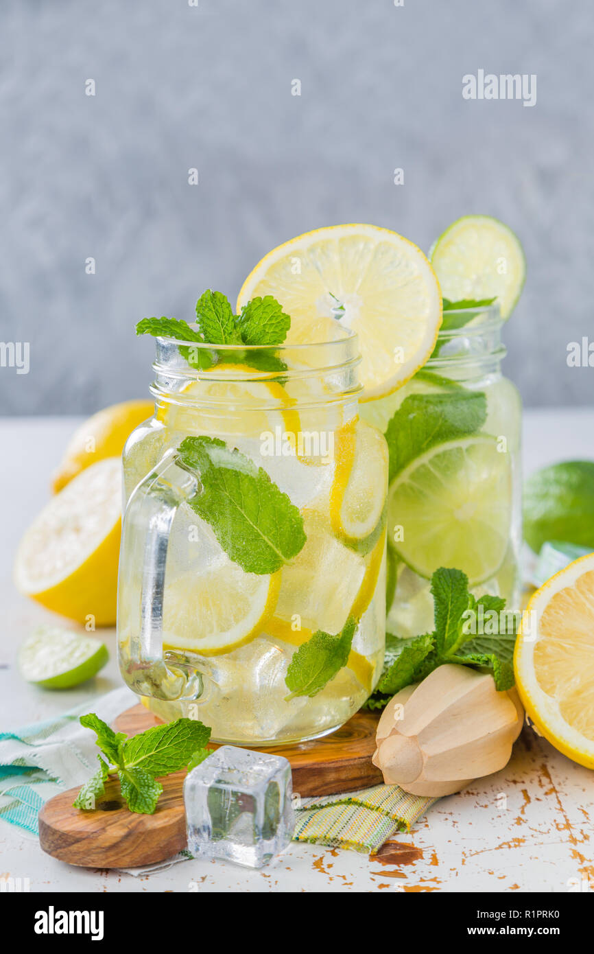 Selection of infused water for detox, wood background Stock Photo - Alamy