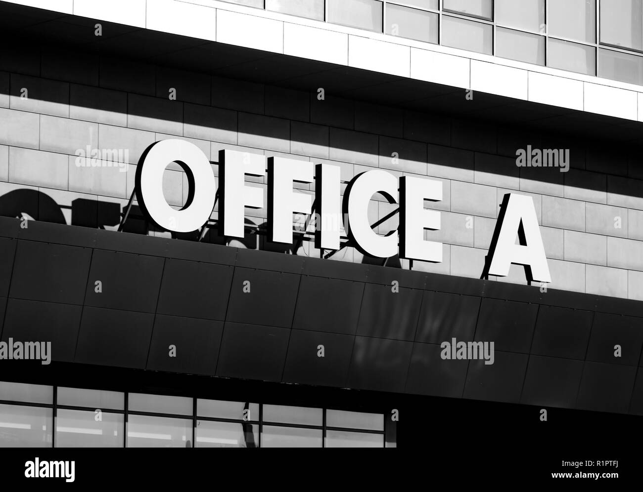 Office A. Giant inscription on office building facade Stock Photo - Alamy