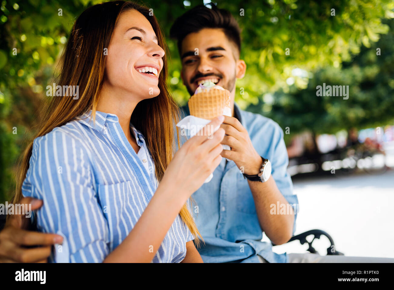 Couple man woman holiday eat ice cream hi-res stock photography and ...
