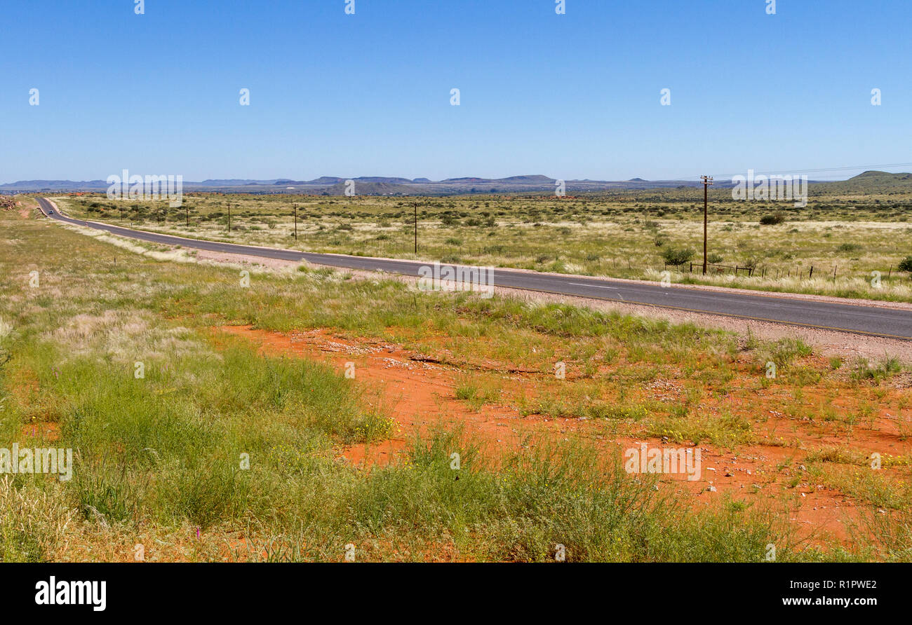 Driving through the arid landscape of the Northern Cape province of ...