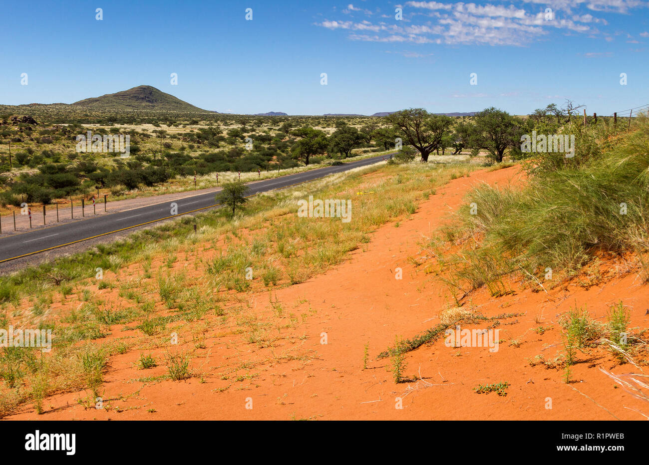 Driving through the arid landscape of the Northern Cape province of ...