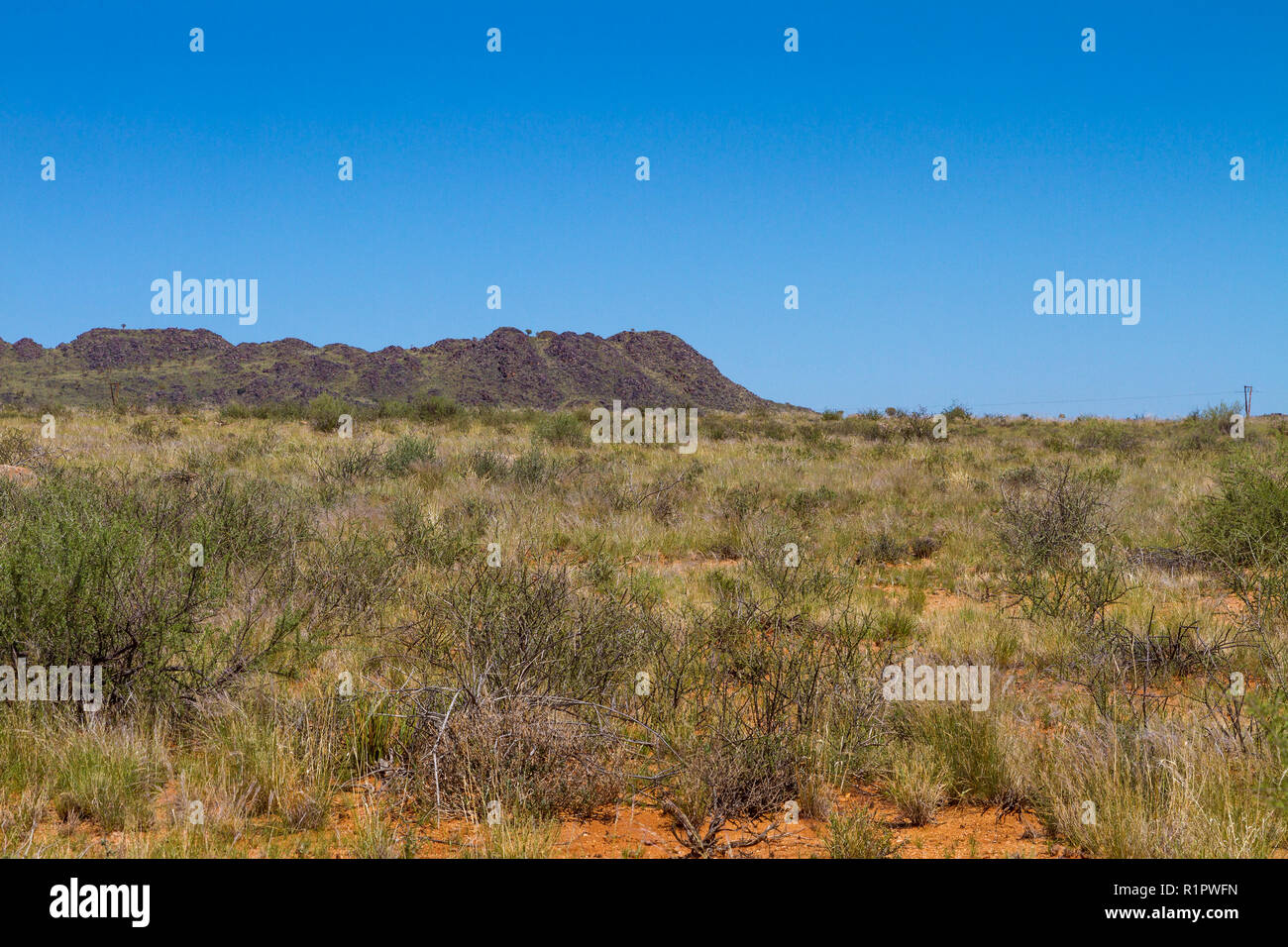 Driving through the arid landscape of the Northern Cape province of ...